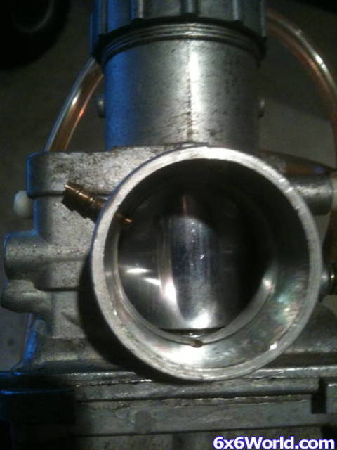 Help ID these two fuel ports on the carb and intake manifold ...